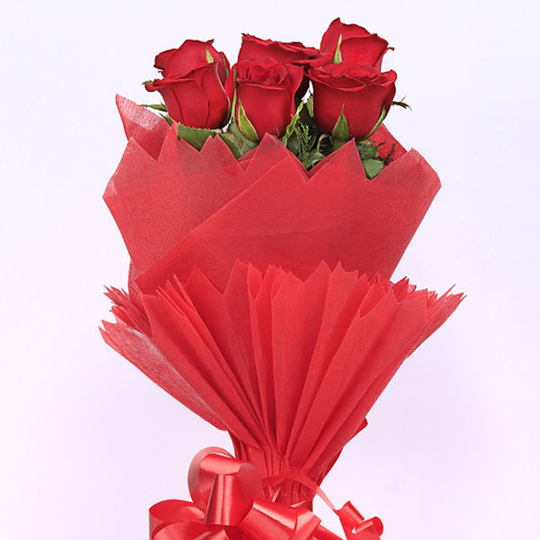 Buy 6 Red Roses In Red Paper Packing To Show Your Love and Care | Winni