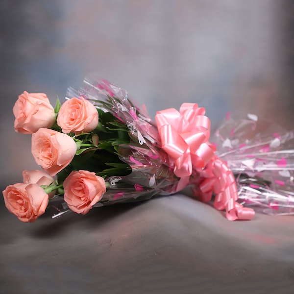 6 Pink Roses in Cellophane Packing | Winni