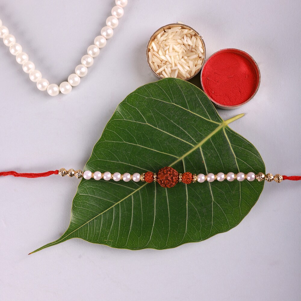 Pearl And Rudraksha Rakhi With Soan Papdi 250 gm | Winni