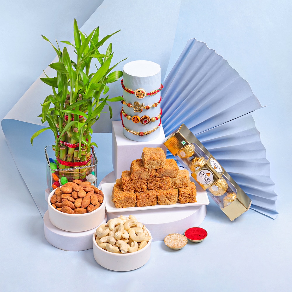 Set Of 4 Rakhi With Bamboo Plant And Sweet Winni