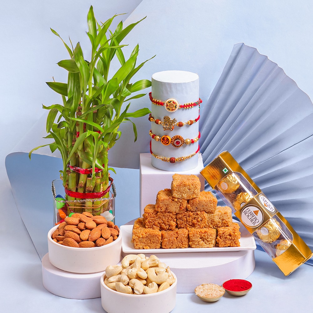 Set Of 4 Rakhi With Bamboo Plant And Sweet Winni