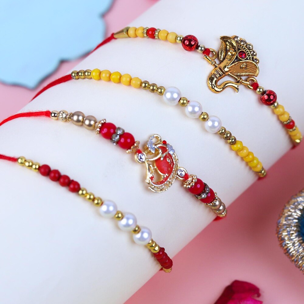 Rakhi Joy with Orange Mini Thali | Winni